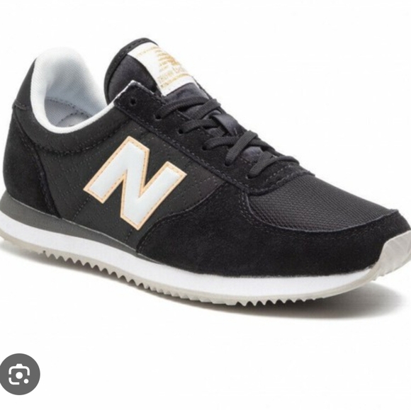 New Balance | Shoes | New Balance Black And Gold Classic Sneakers ...